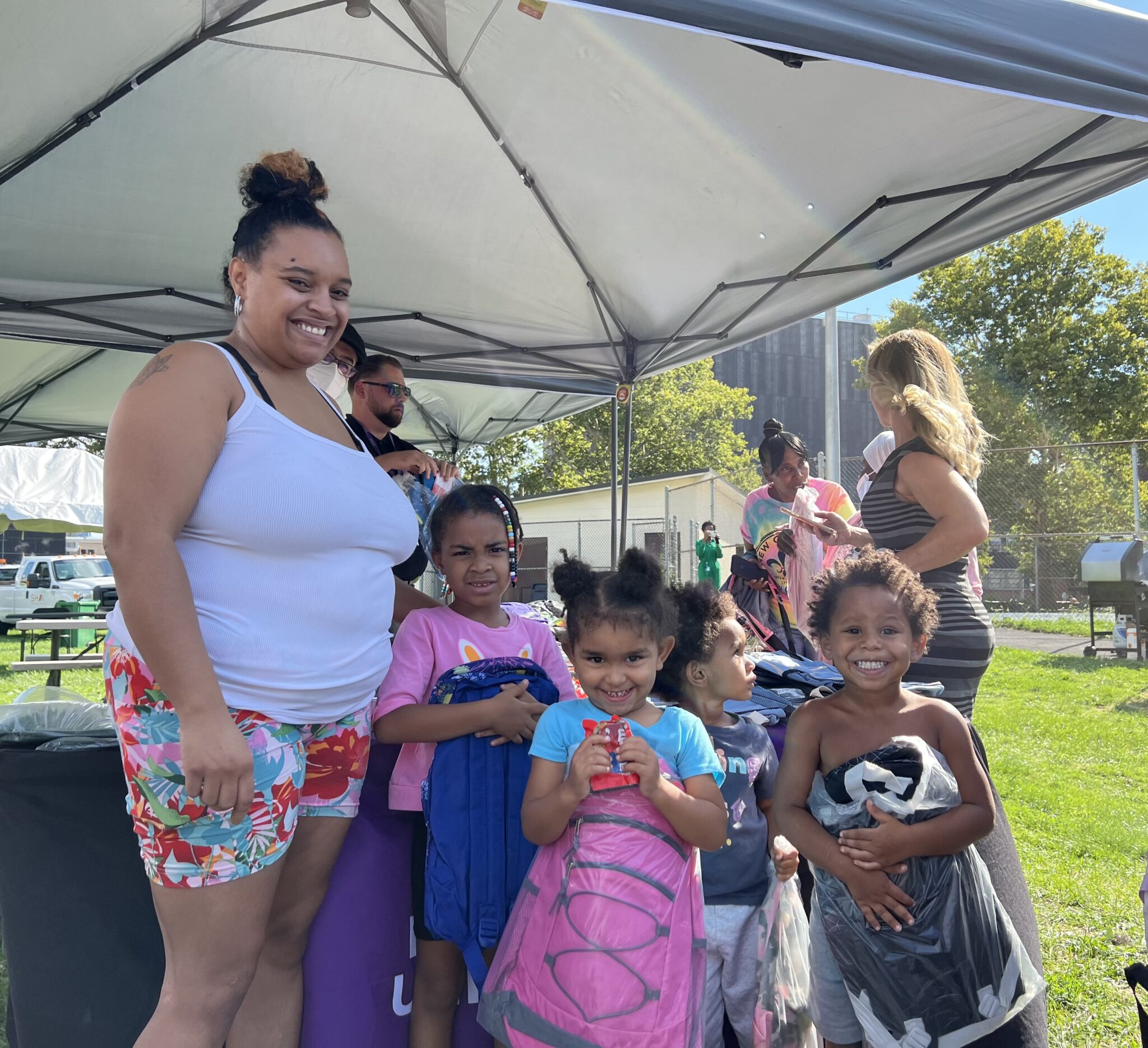 Excelsior University Staff Donate Backpacks - Excelsior University